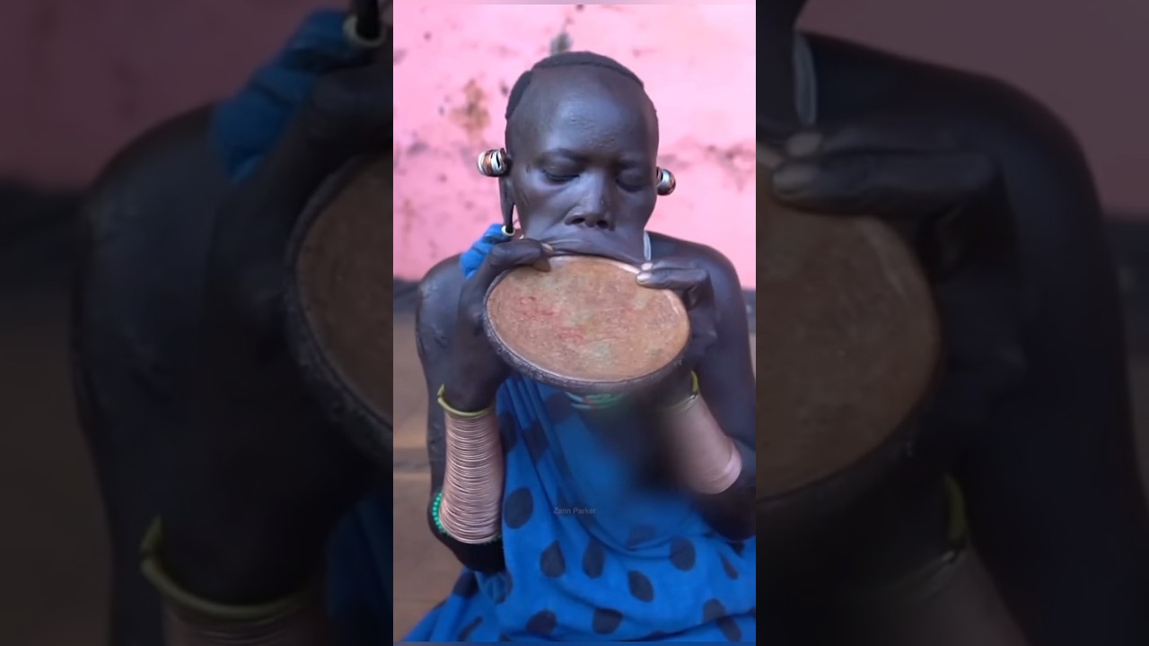 African tribe wearing nose plate - Guapify